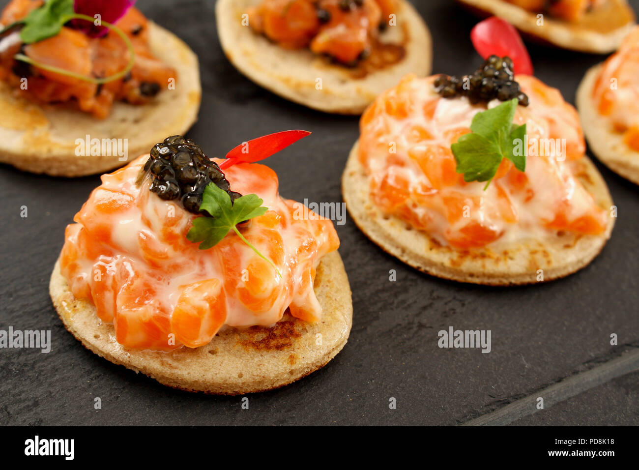 smoked salmon blinis canapes Stock Photo - Alamy