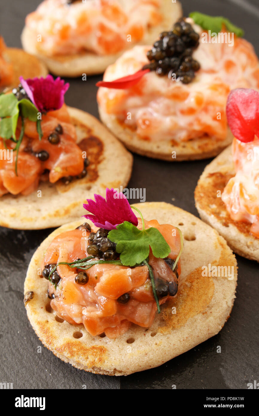 smoked salmon blinis canapes Stock Photo - Alamy