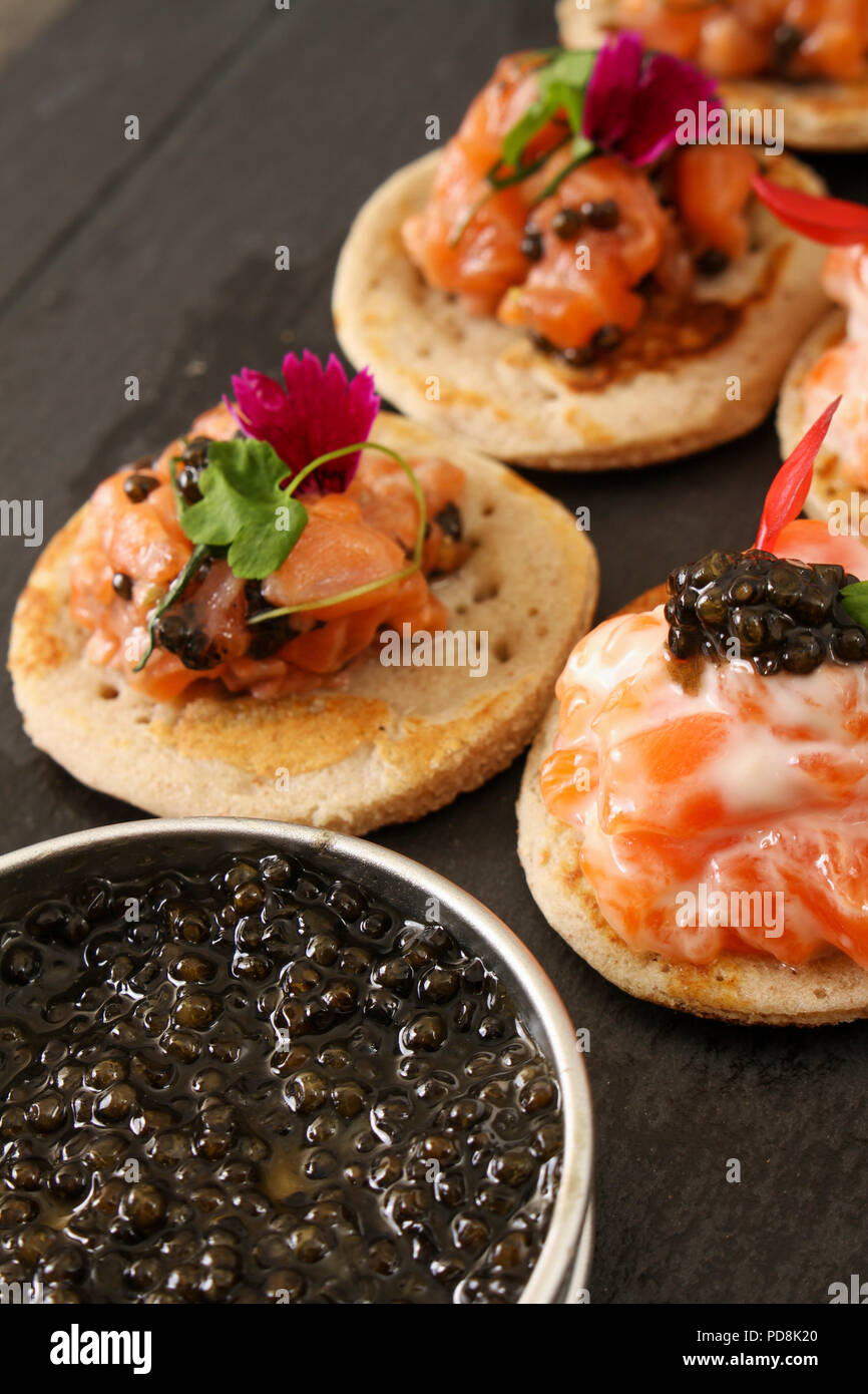 smoked salmon blinis canapes Stock Photo - Alamy