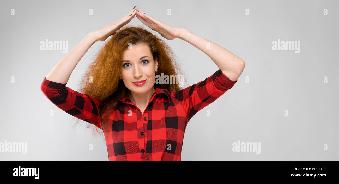 Attractive woman with hands above Stock Photo - Alamy
