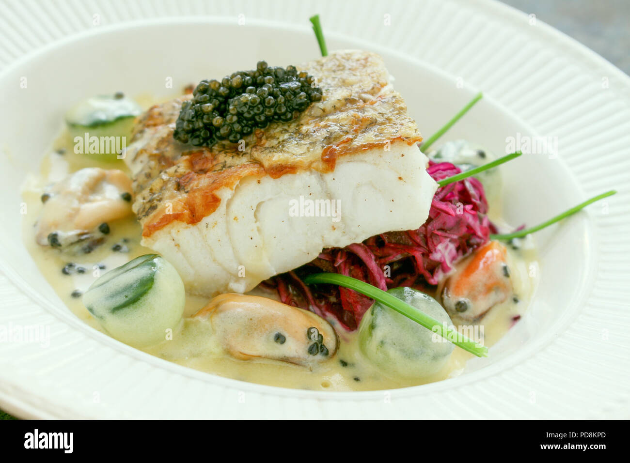 Plated cod loin meal hi-res stock photography and images - Alamy