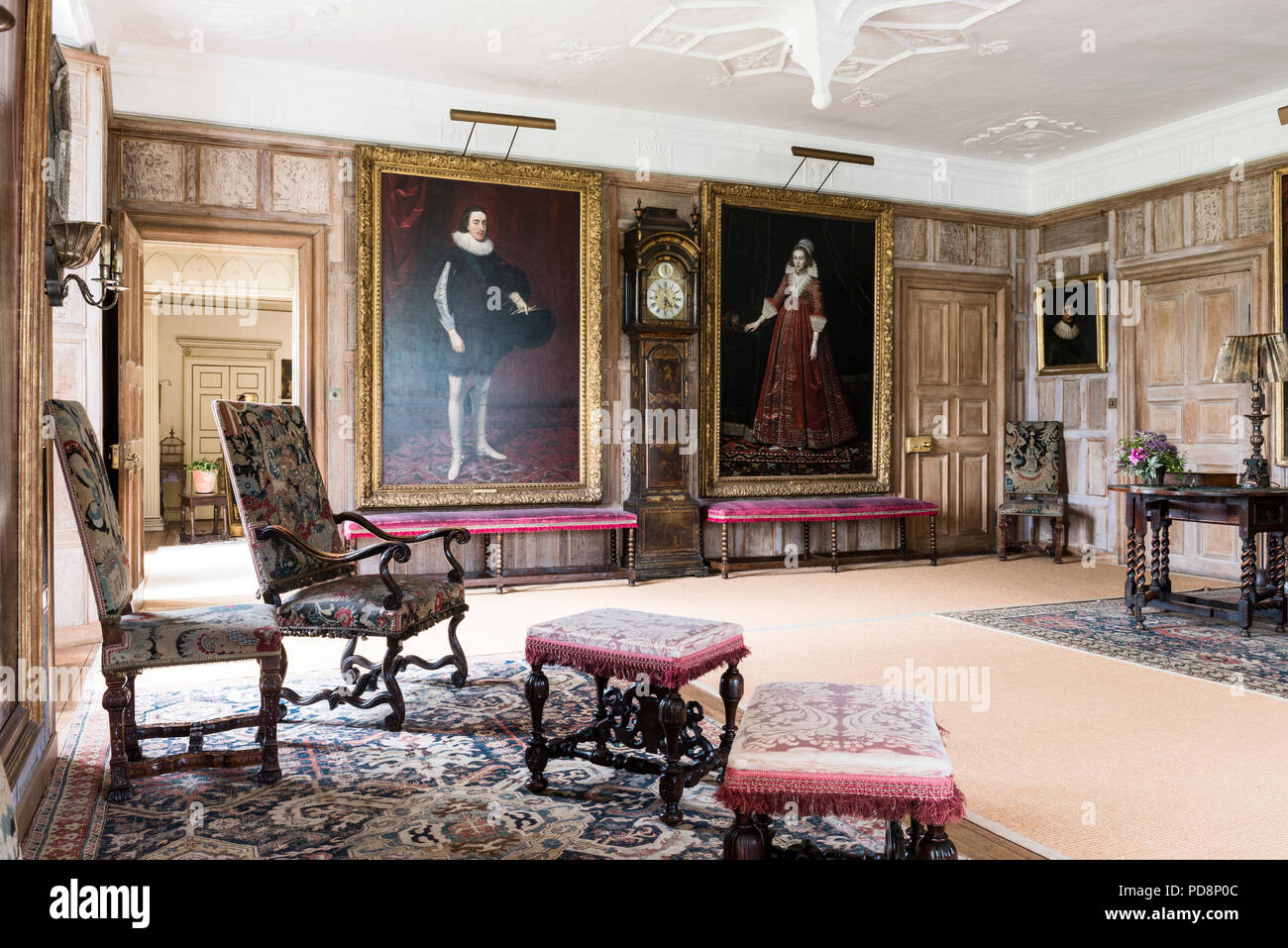 Large Tudor and Jacobean portraits with 17th century upholstered chairs ...