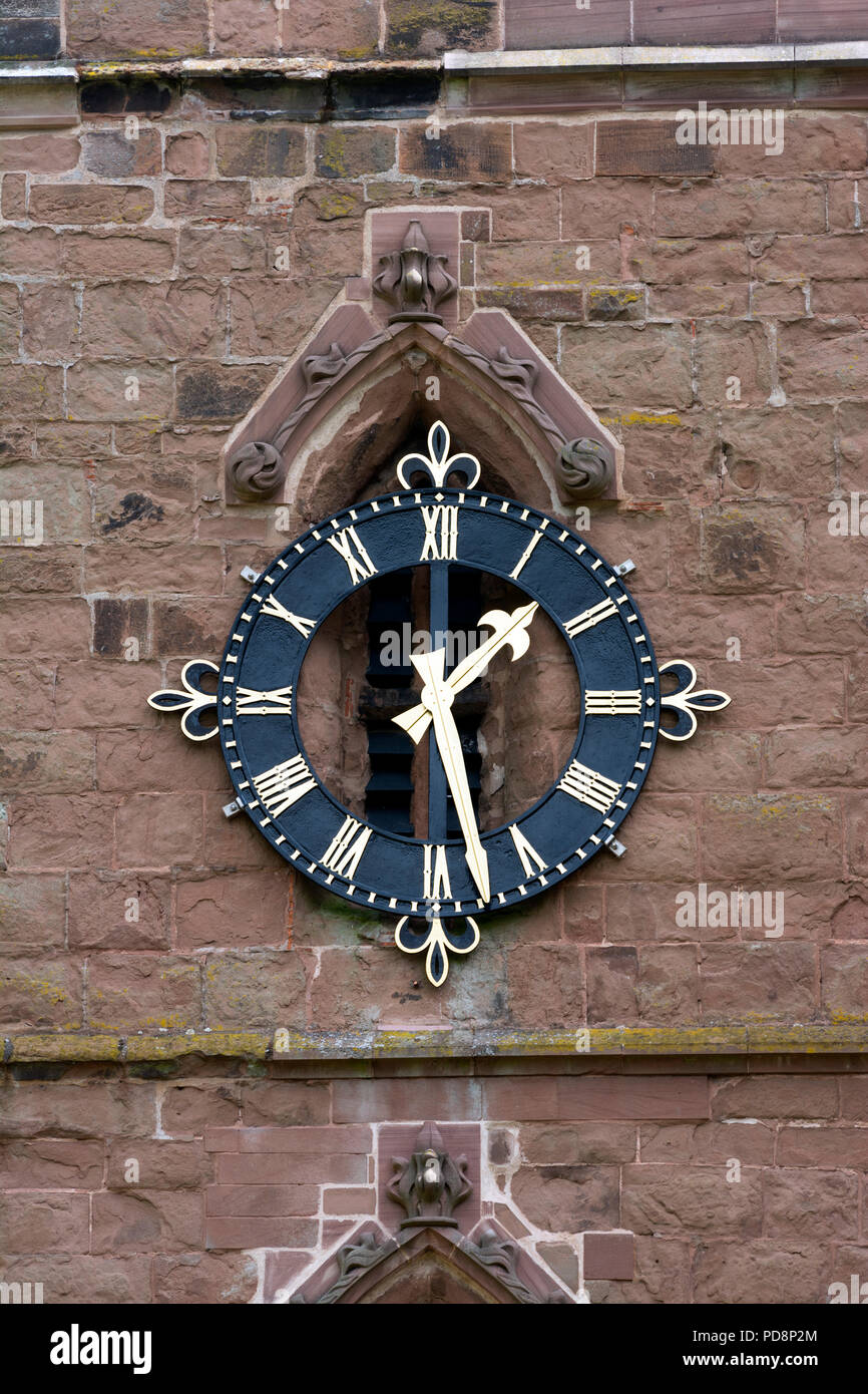 The clock on St. Giles Church, Sheldon, Birmingham, UK Stock Photo - Alamy
