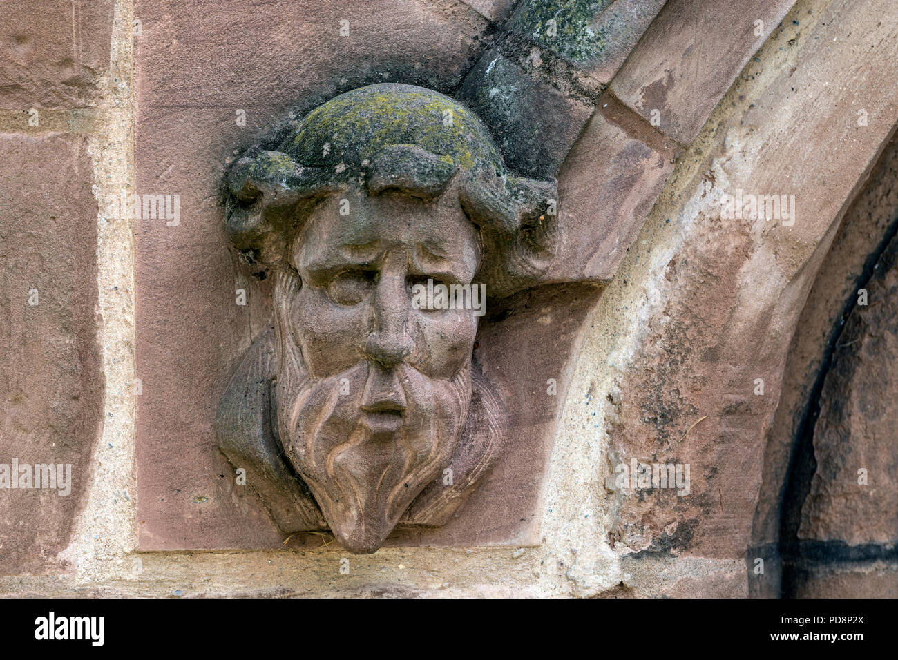 Carved head by west doorway, St. Giles Church, Sheldon, Birmingham, UK ...