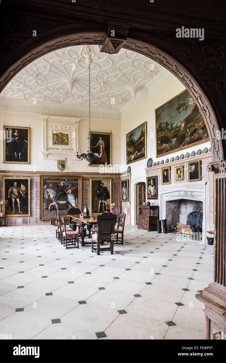 View through decorative wooden archway to restored banqueting hall with ...