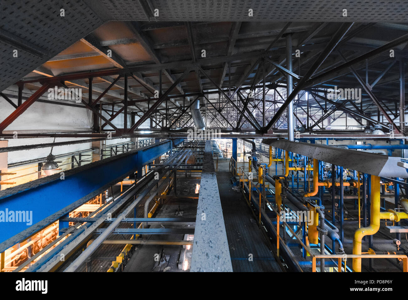 Fiberglass production industry equipment at manufacture background ...