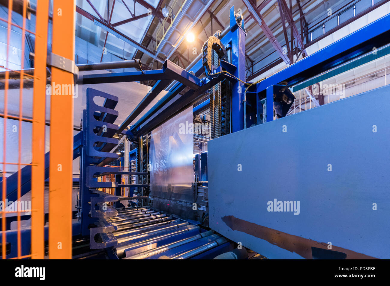 Fiberglass production industry equipment at manufacture background ...