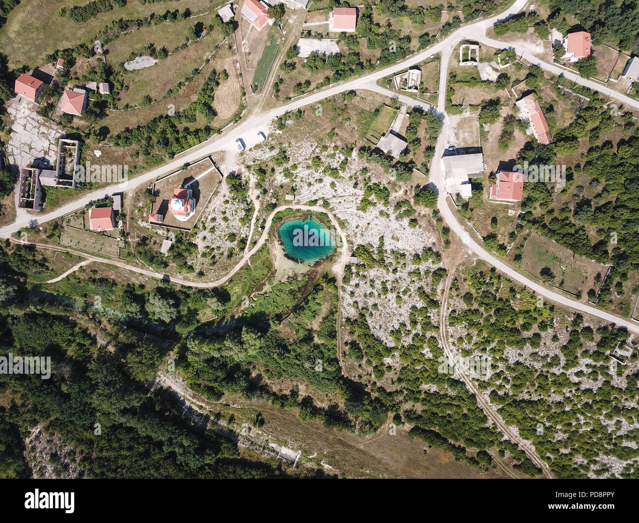 The spring of the Cetina River (izvor Cetine) in the foothills of the ...
