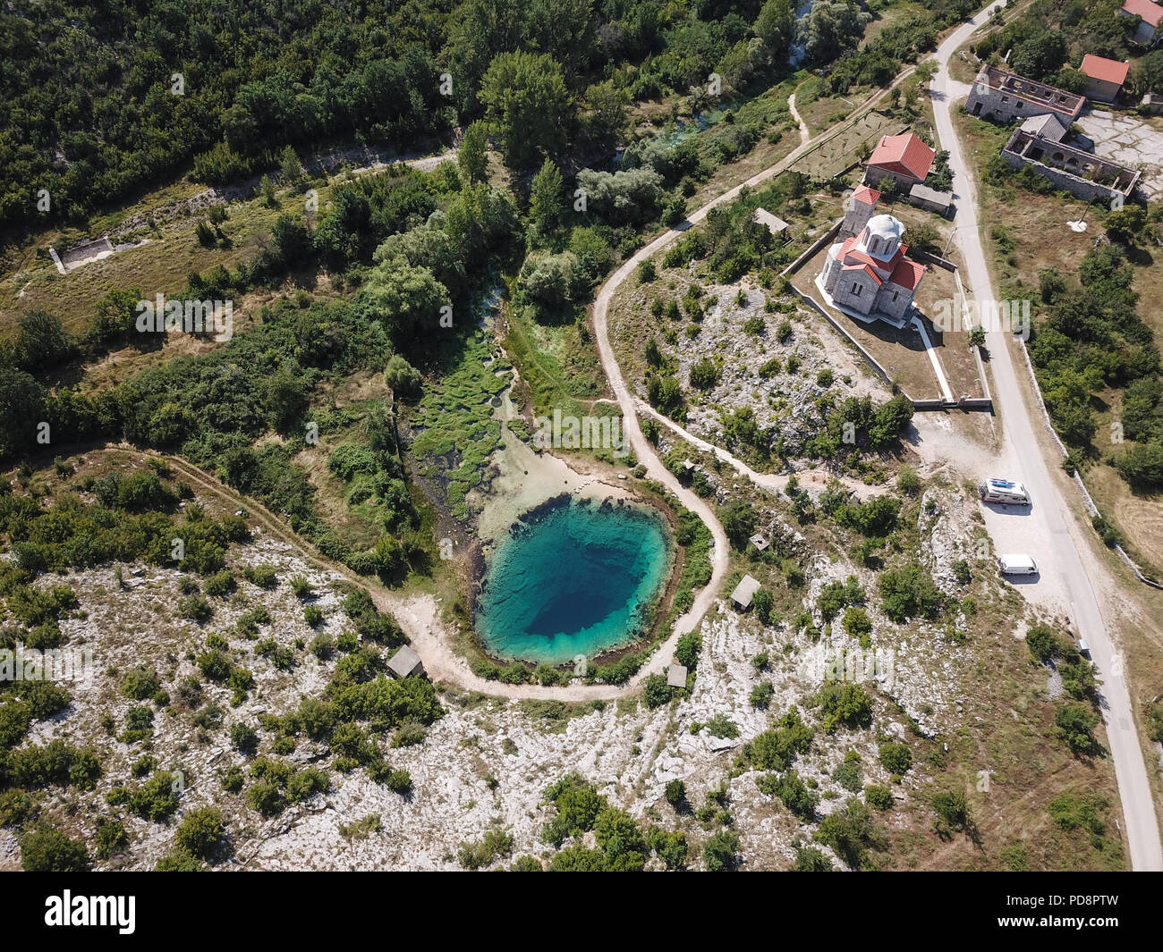 The spring of the Cetina River (izvor Cetine) in the foothills of the ...