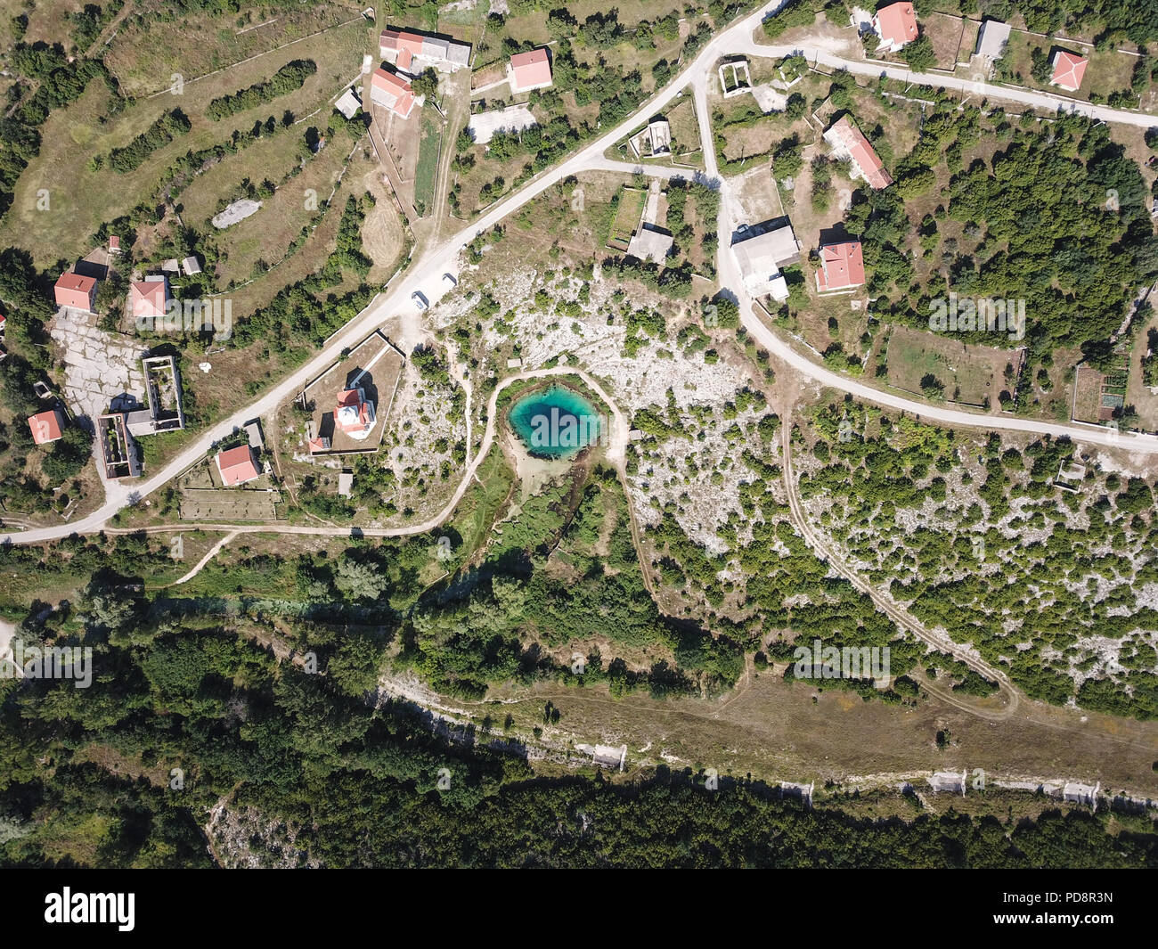 The spring of the Cetina River (izvor Cetine) in the foothills of the ...