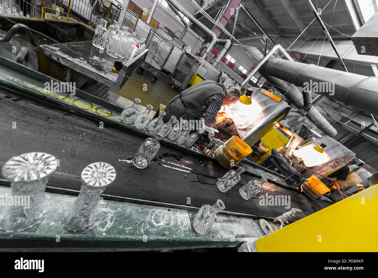 Minsk, Belarus - February 01, 2018: Glass production worker working ...
