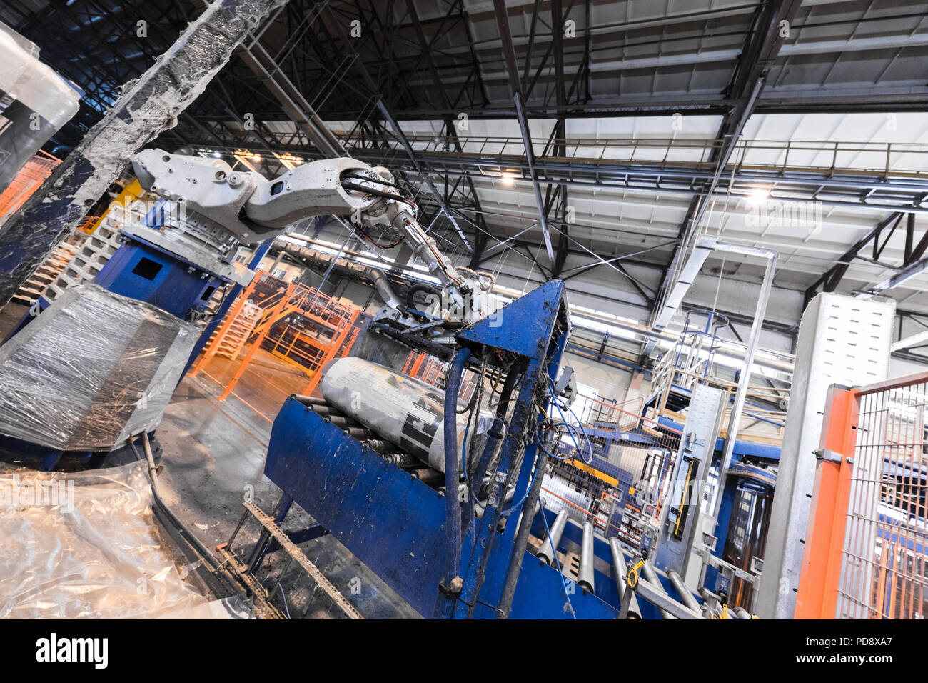 Factory workshop interior and machines on glass production background ...