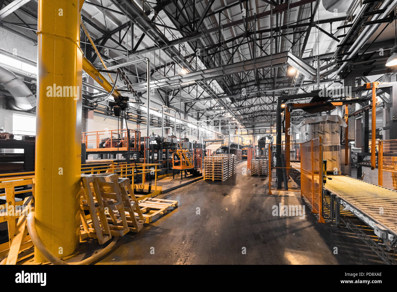 Factory workshop interior and machines on glass production background ...