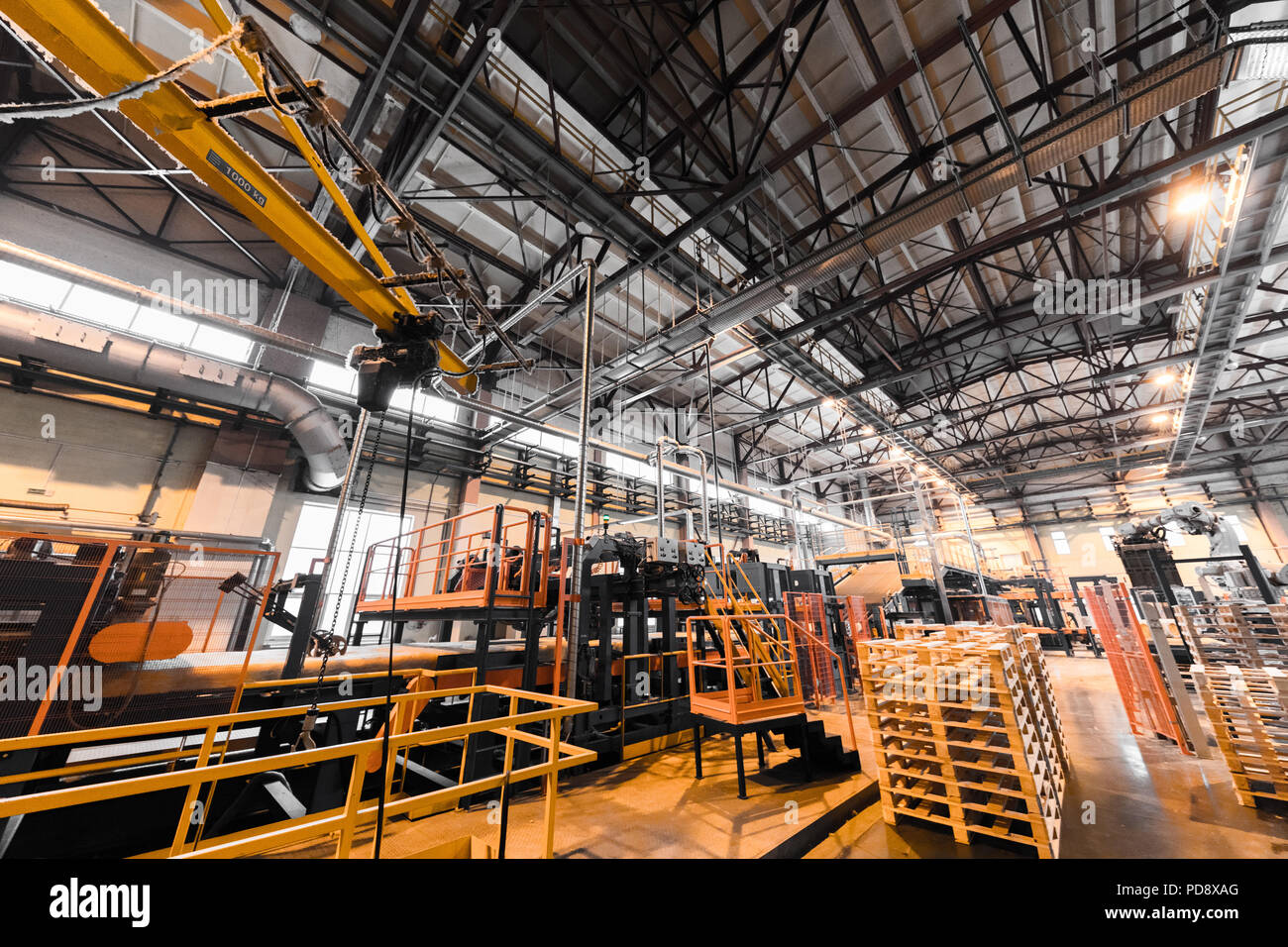 Factory workshop interior and machines on glass production background ...