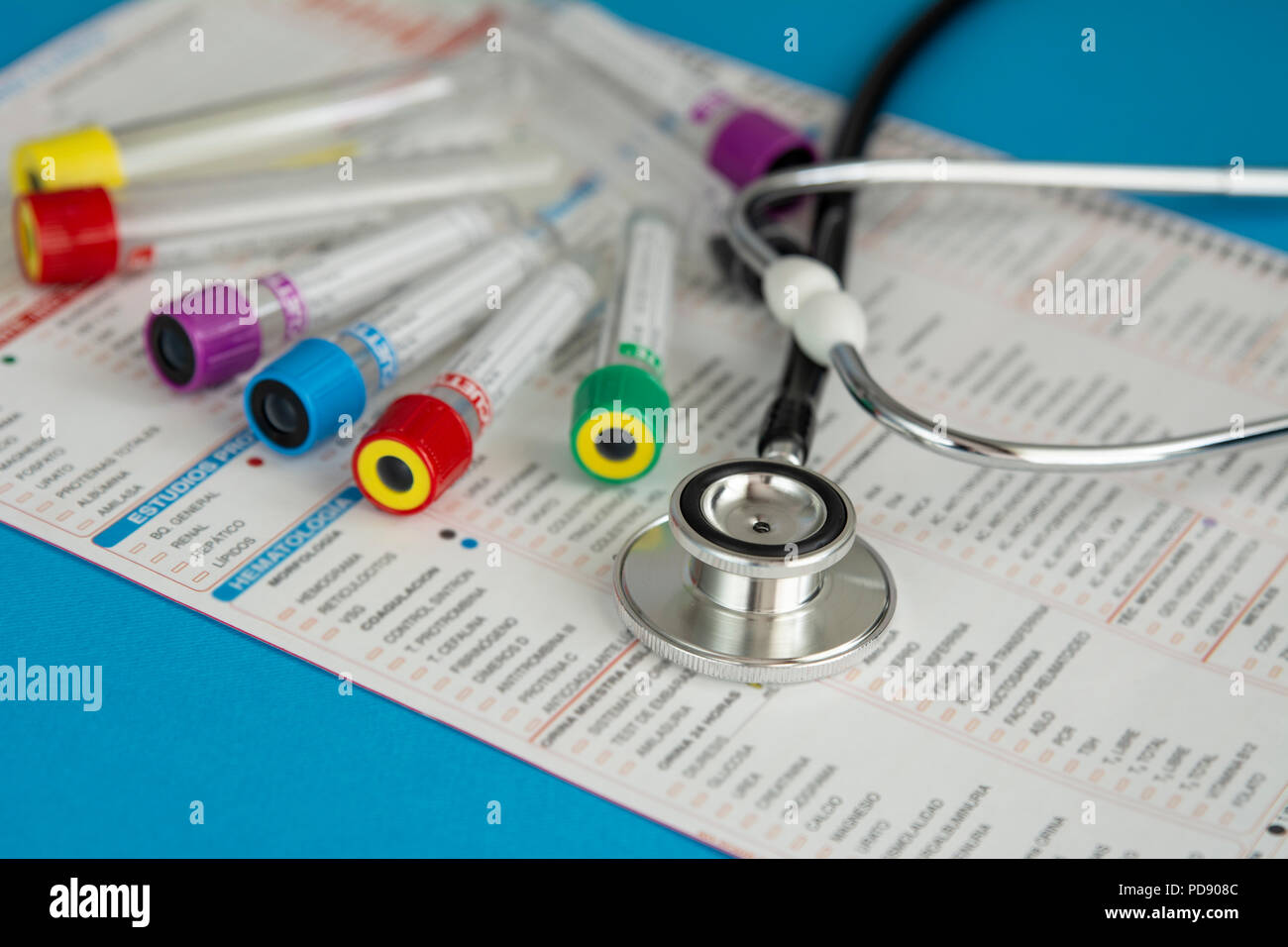 laboratory work table with report and tubes to collect samples for ...