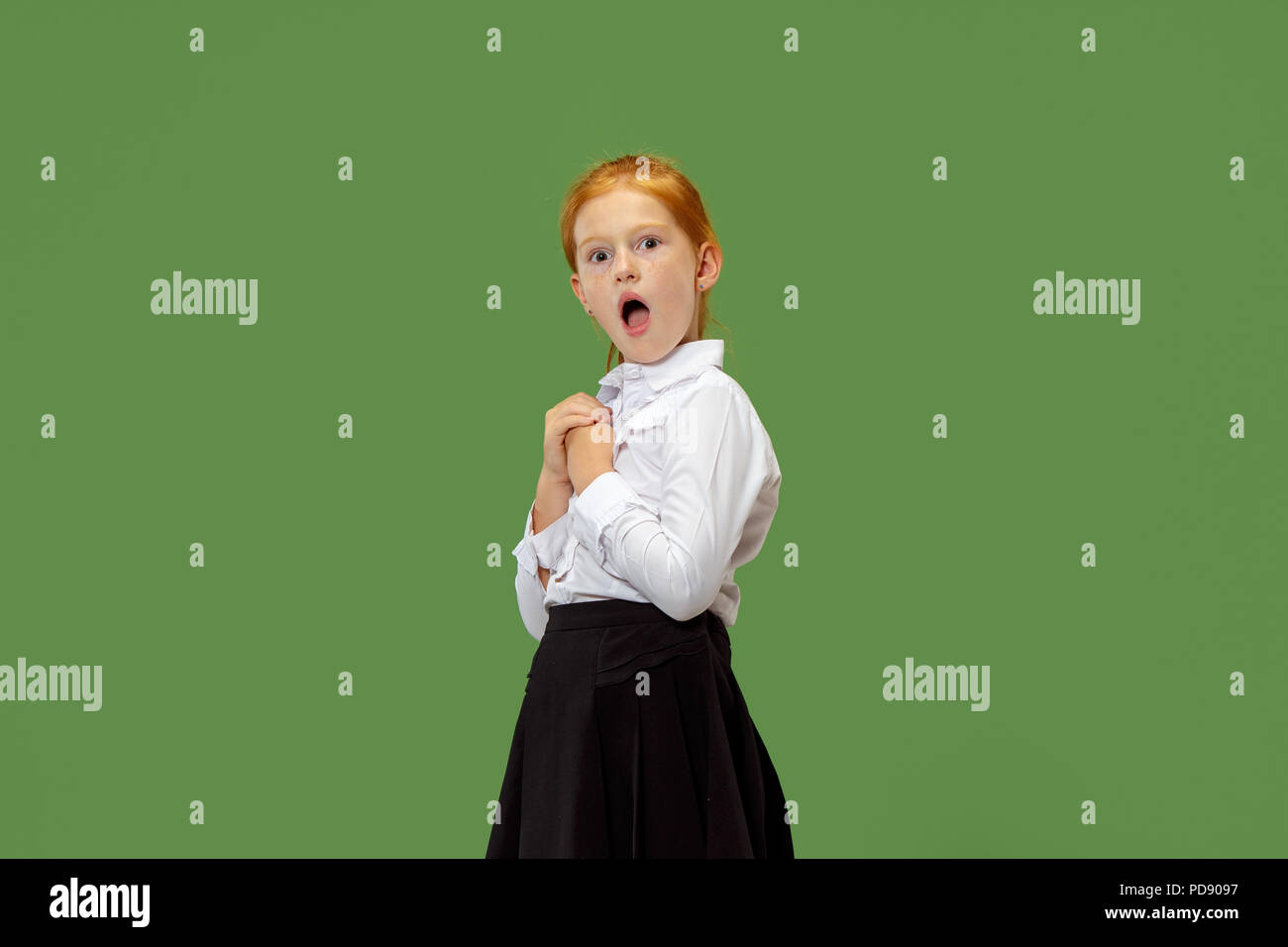 Wow. Beautiful female half-length front portrait isolated on green ...