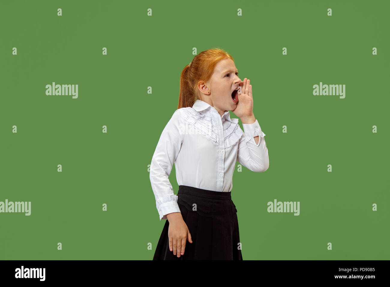 Do not miss. Young casual teen girl shouting. Shout. Crying emotional ...