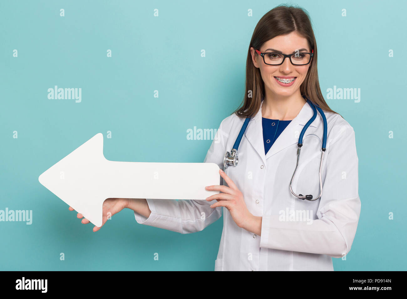 Female doctor with paper pointer Stock Photo - Alamy