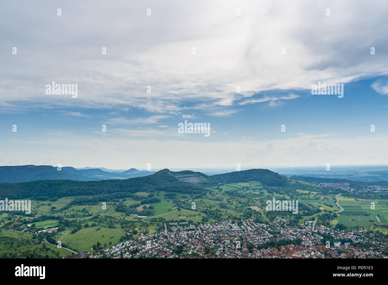 Germany, Endless landscape view over village Neuffen and green ...
