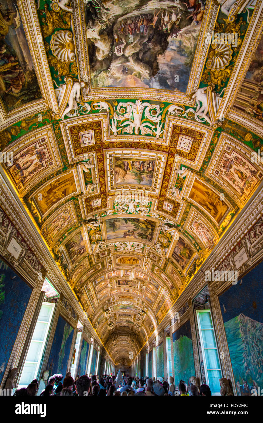 Crowds admire the ceiling of the Map Room in the Vatican Museum, Rome ...