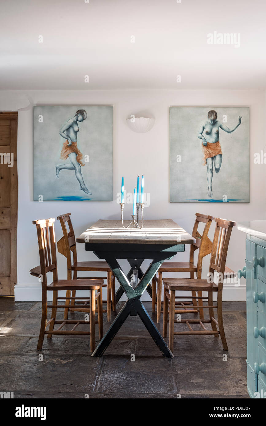 Pair of paintings by James Wedge flanking a wooden farmhouse style ...