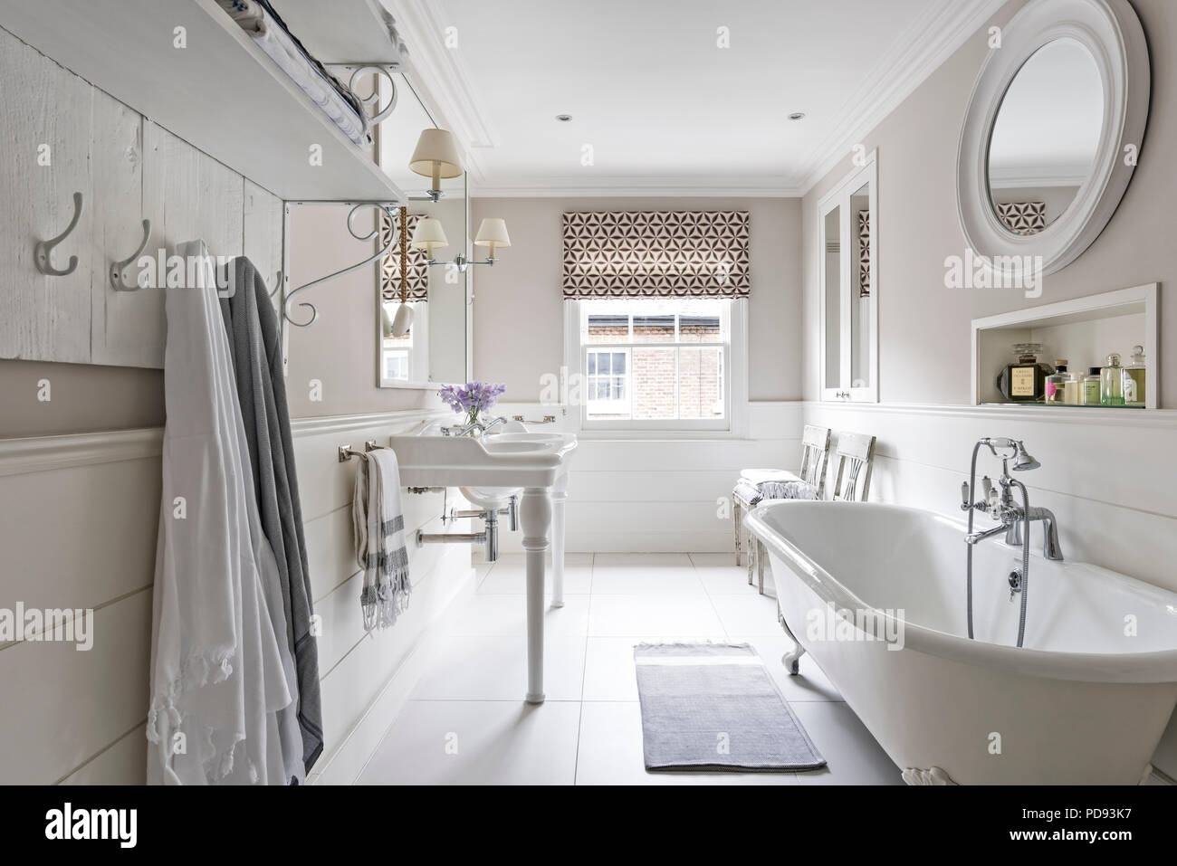 French-style basins and a free standing bath in master bathroom. The ...
