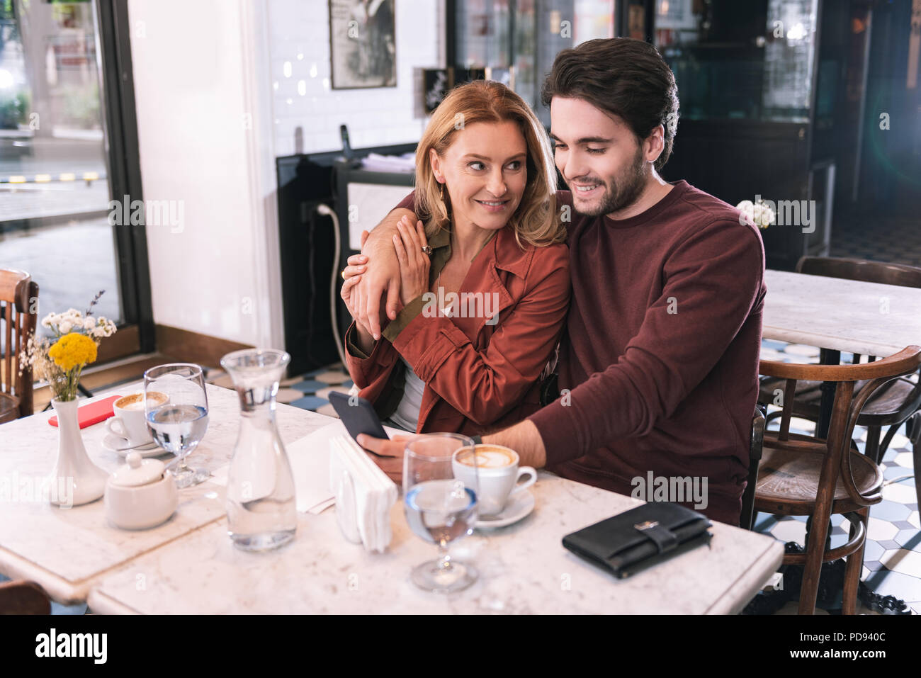 Happy positive couple surfing Internet Stock Photo - Alamy