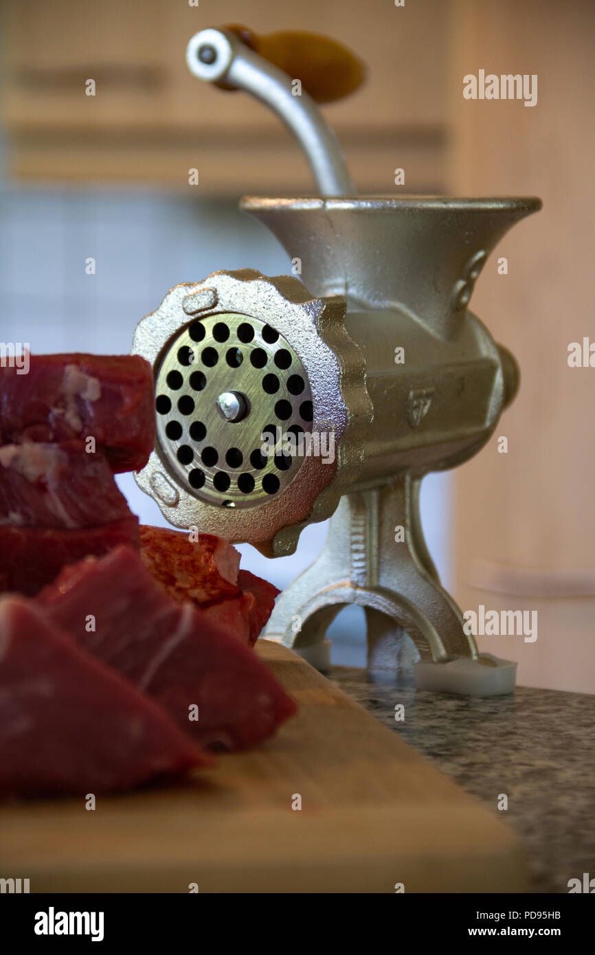 A meat grinder stands in a kitchen Stock Photo - Alamy