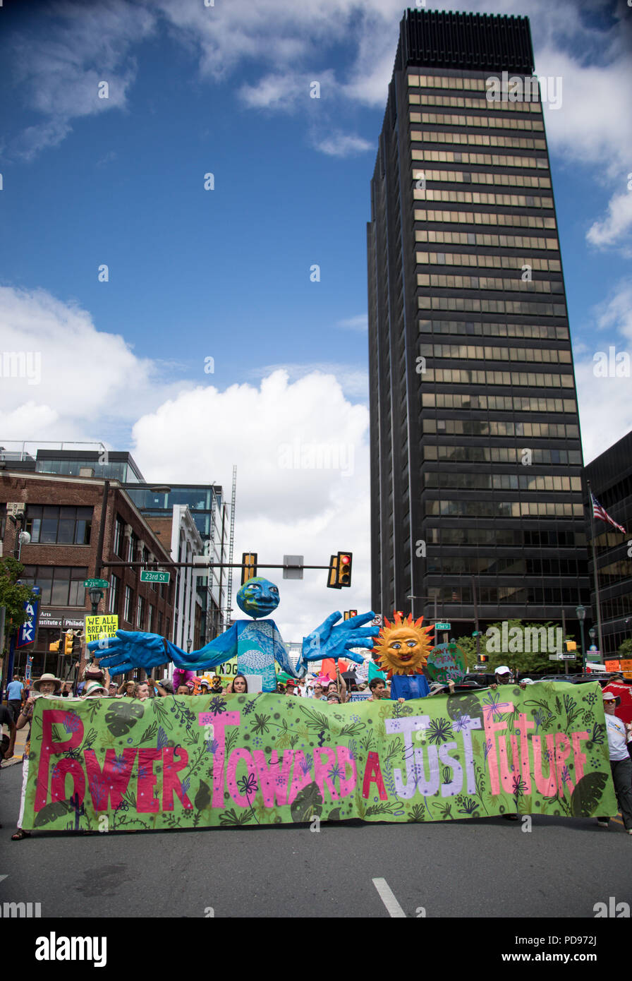 Environmental groups gather to march for a green energy future ...