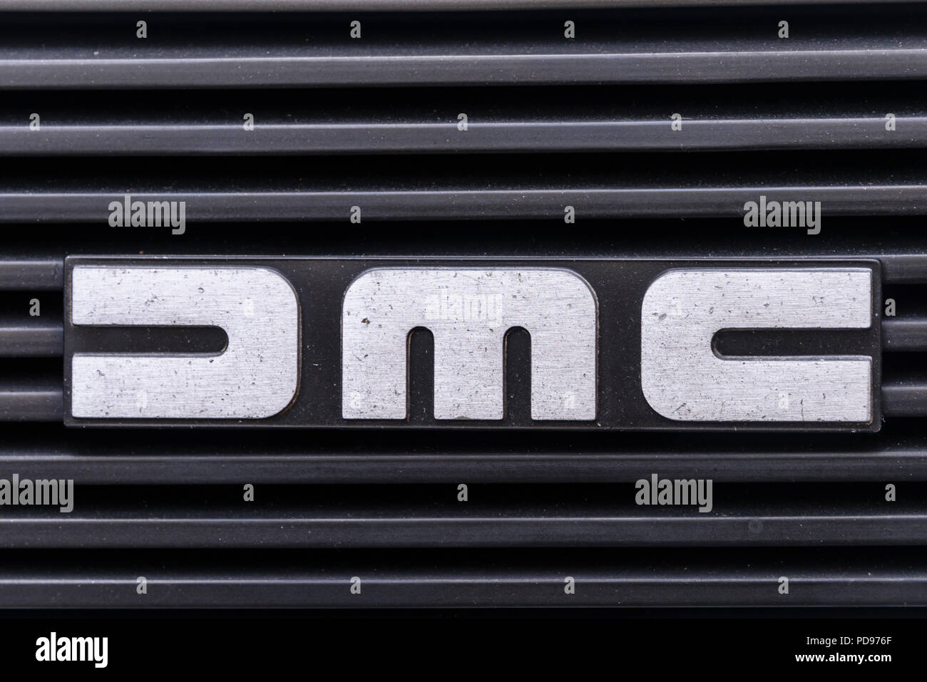 DMC badge on the grille of a De Lorean DMC-12 Stock Photo - Alamy