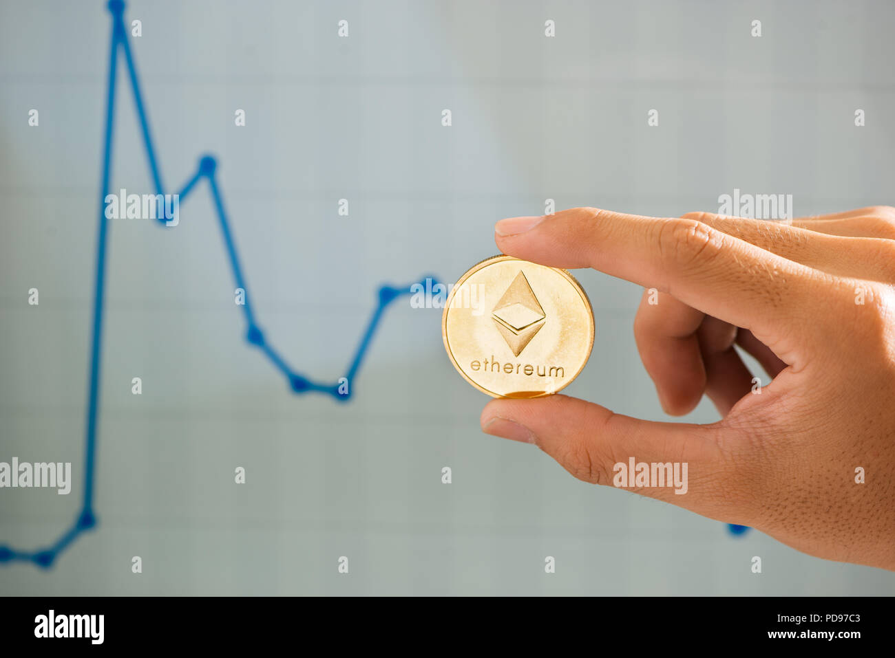 Ethereum. Ethereum with hand computer background. Concept chart up in ...