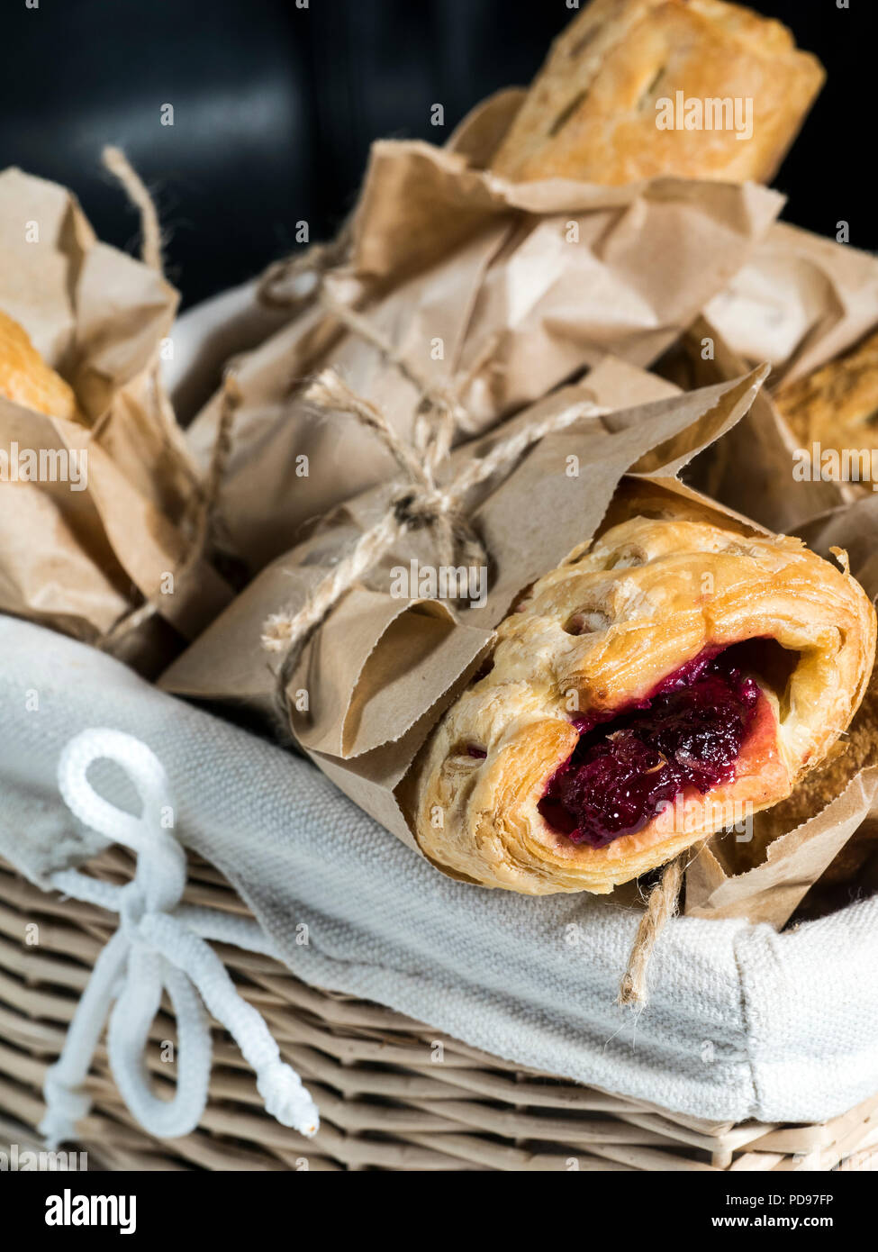 rolls of puff pastry with fruit jam Stock Photo - Alamy