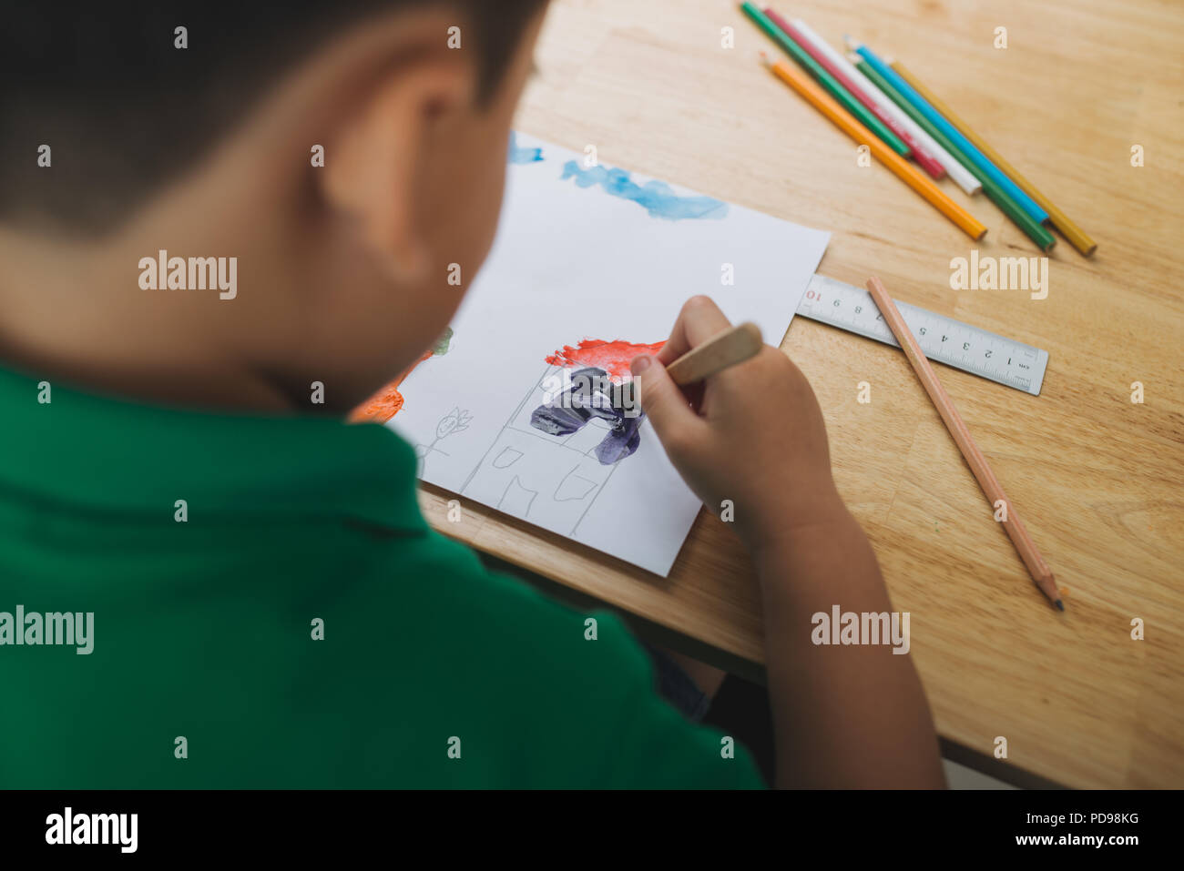 Back view boy student drawing hi-res stock photography and images - Alamy