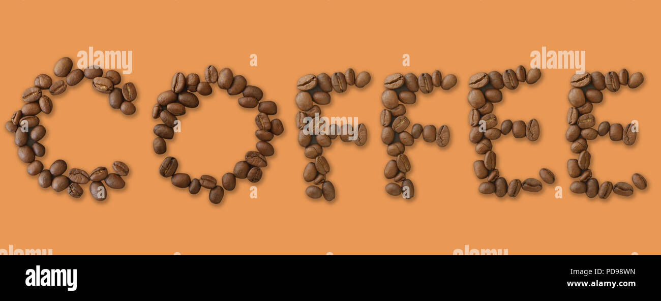 Coffee word made of coffee beans on brown background - close up concept ...