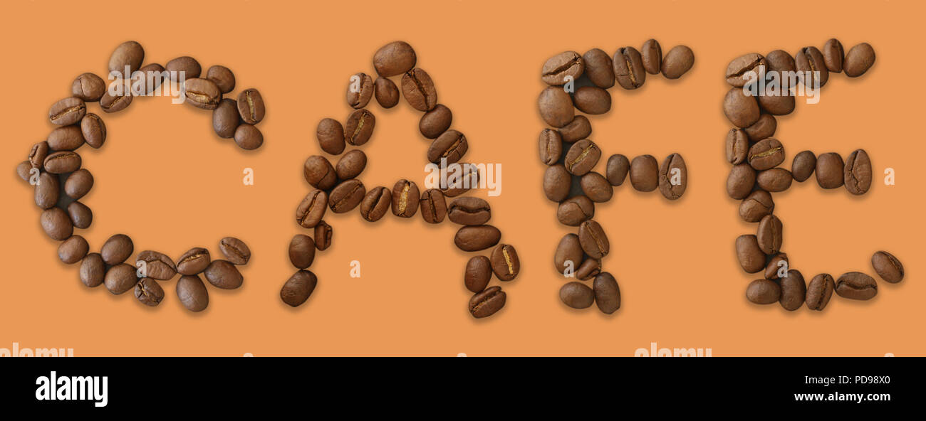 Cafe word made of coffee beans on brown background - close up concept ...