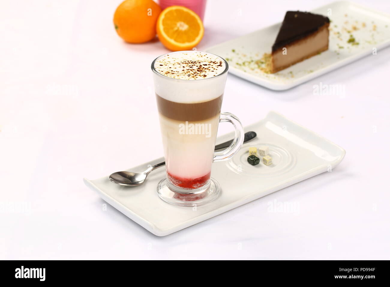 Fruit Latte macchiato with whipped cream and dragee Stock Photo - Alamy