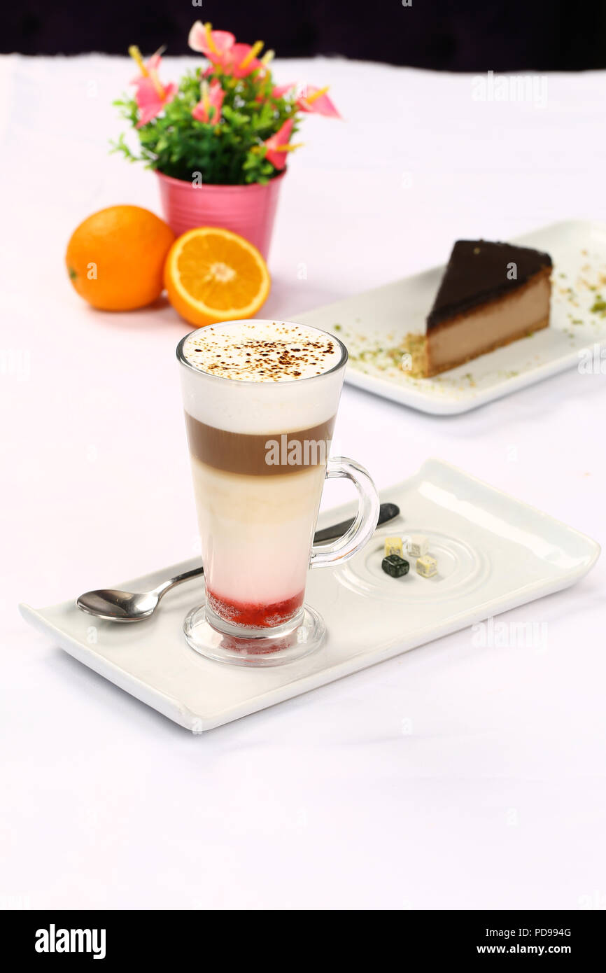 Fruit Latte macchiato with whipped cream and dragee Stock Photo - Alamy