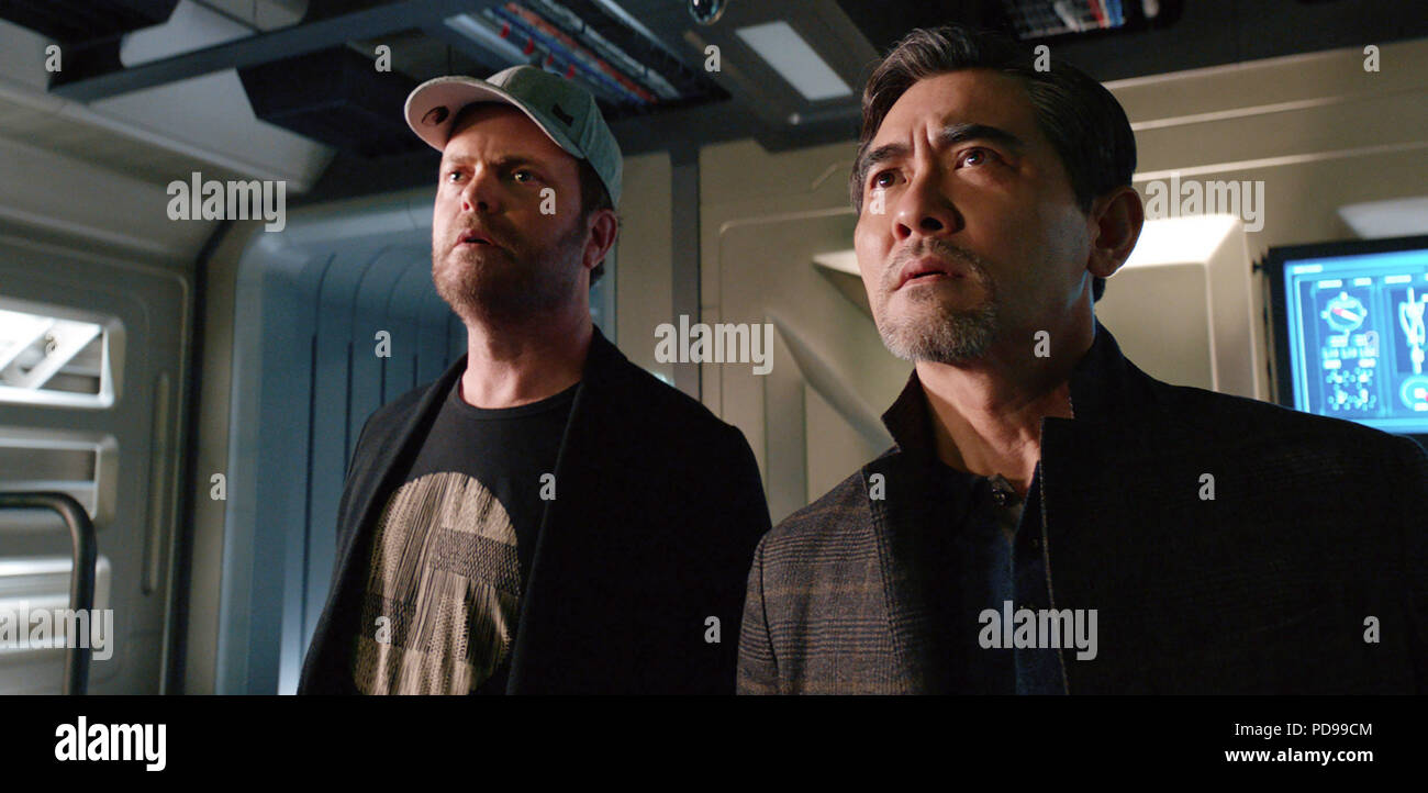 THE MEG, from left: Rainn Wilson, Winston Chao, 2018. /© Warner Bros ...