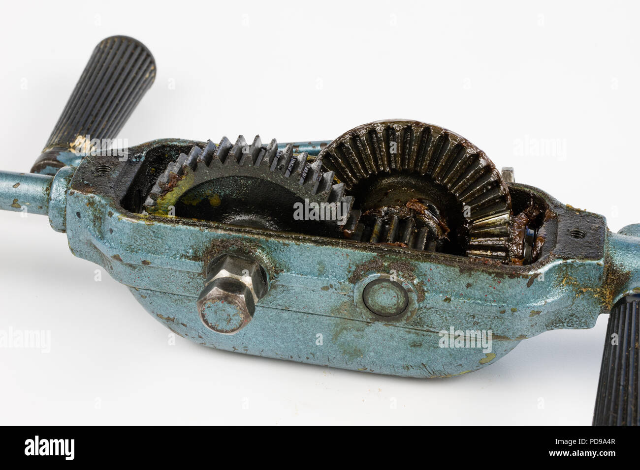 Toothed gear in carpentry tools. An old hand drill for drilling holes ...
