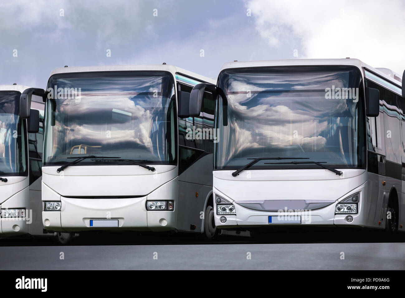 passenger buses in a row Stock Photo - Alamy