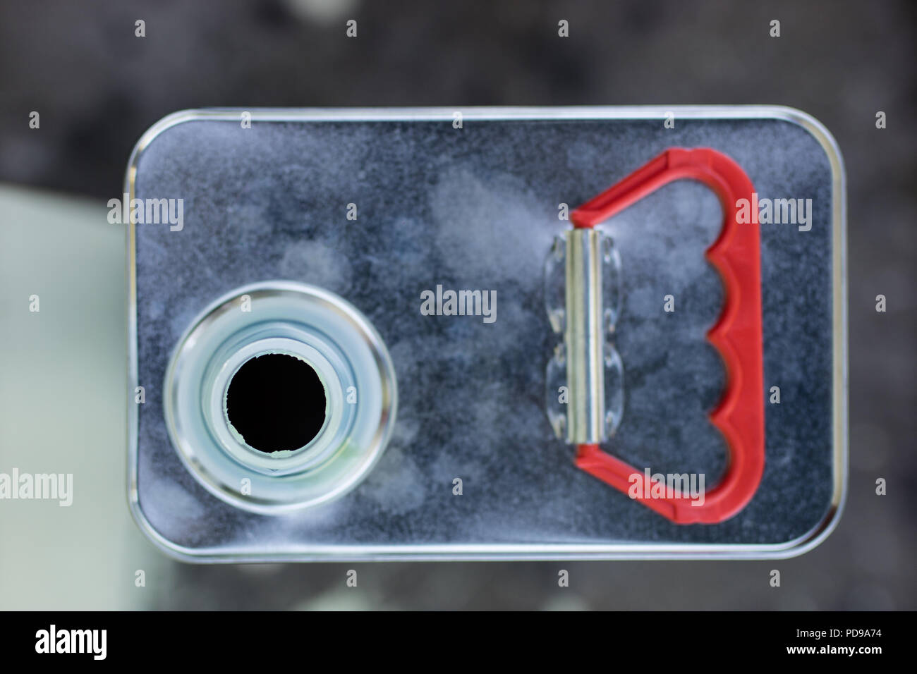 A metal container for oil for an internal combustion engine. Oil change ...