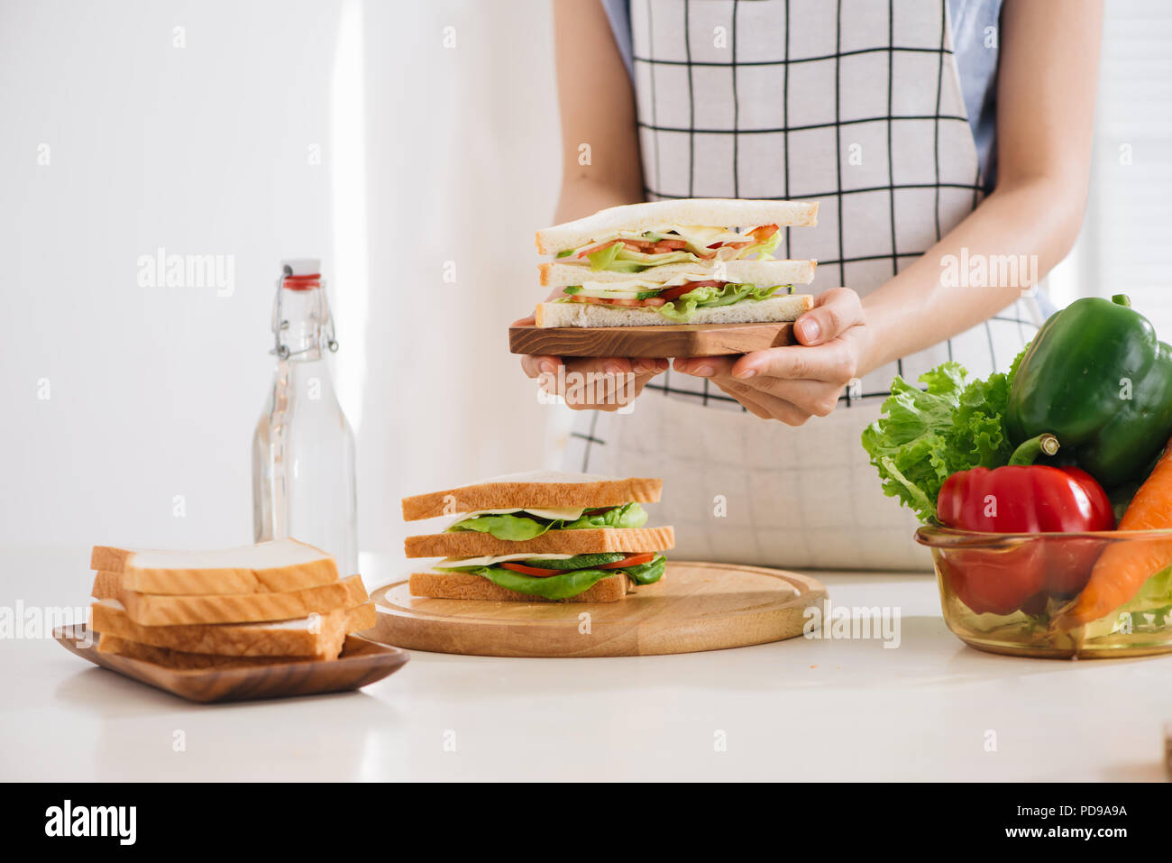 Asian female preparing food (fruits and vegetables) for healthy eating ...
