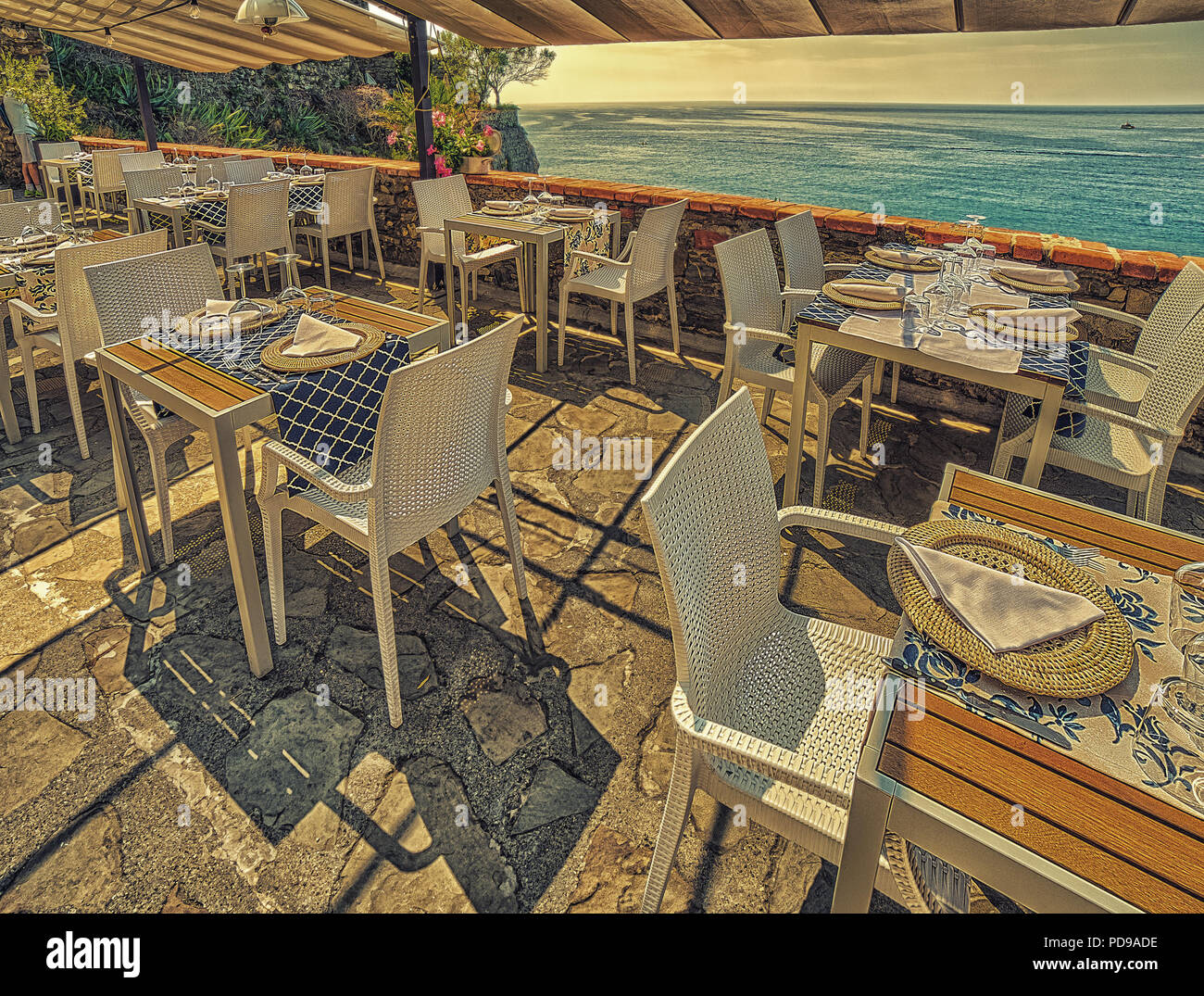 terrace of Italian restaurant overlooking the sea in Five Lands Stock ...
