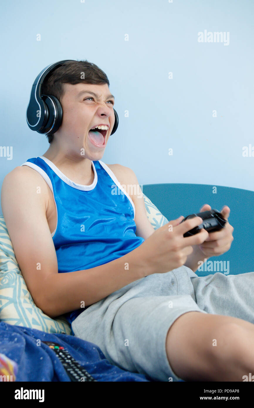 Man and computer games and angry hi-res stock photography and images ...