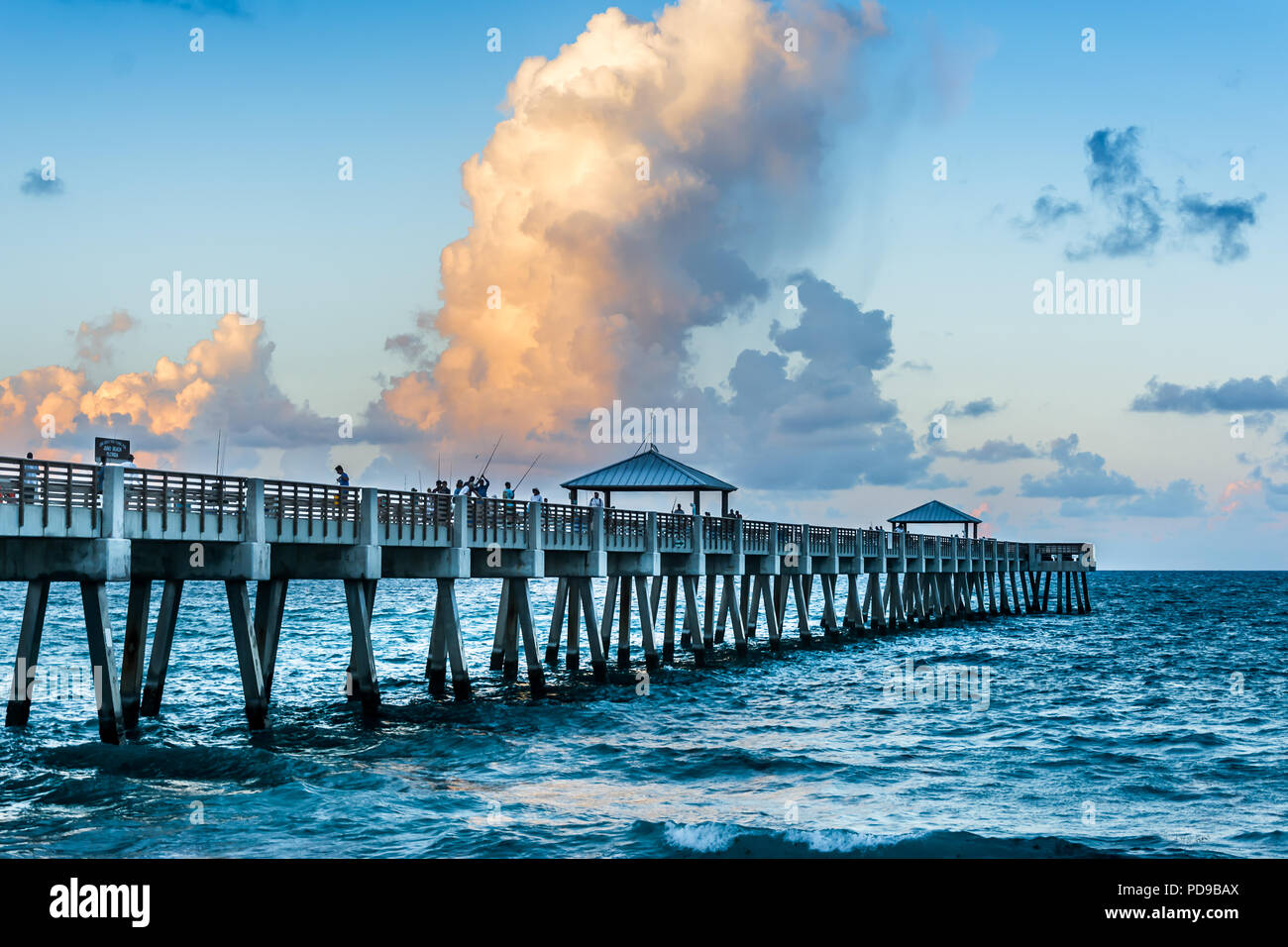 Juno Beach Pier sunset Stock Photo - Alamy