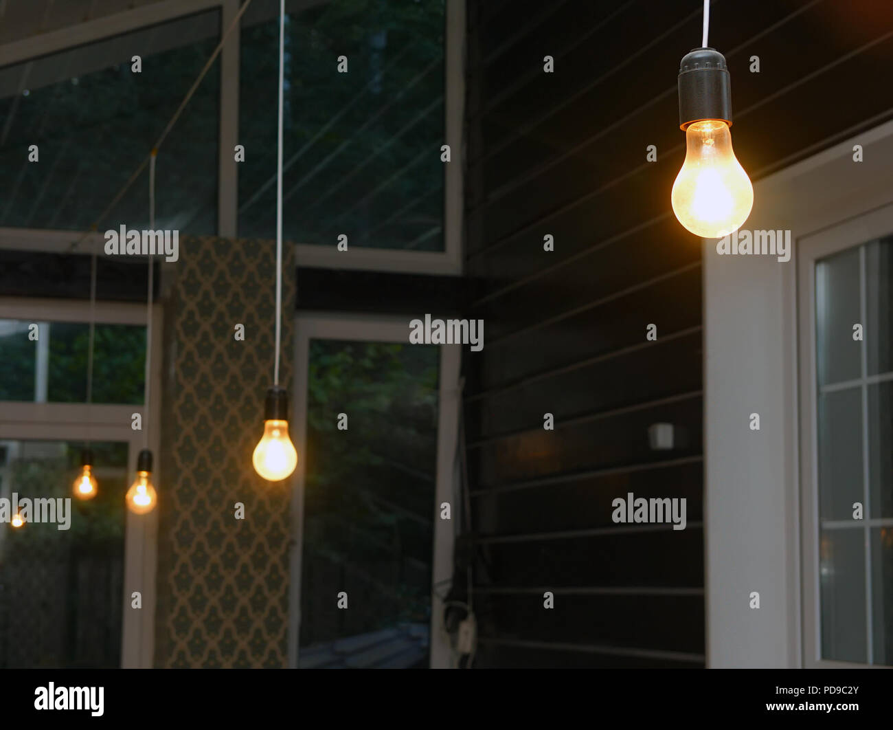 Electric lamps arranged in a row, indoor selective focus shot Stock ...