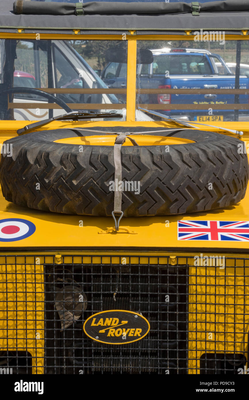 a military british made built land rover painted yellow for armed ...