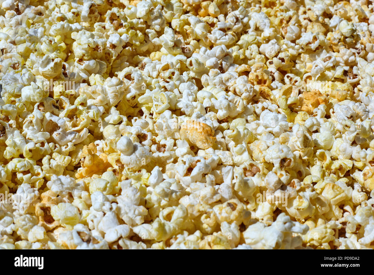 Popcorn as background Stock Photo - Alamy