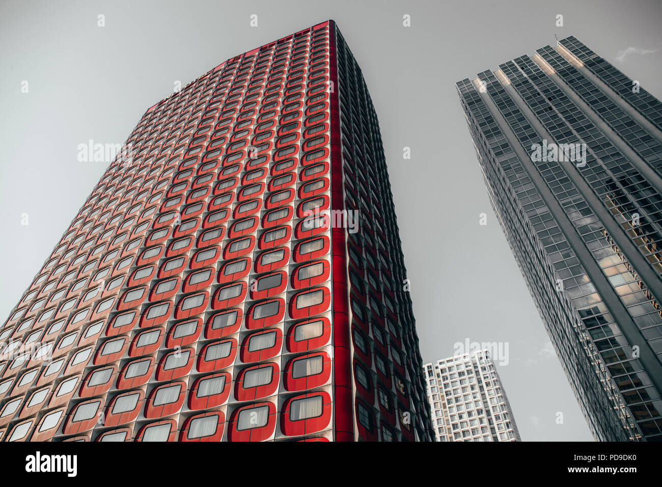Modern red accented building facade, Beaugrenelle, Paris, France ...