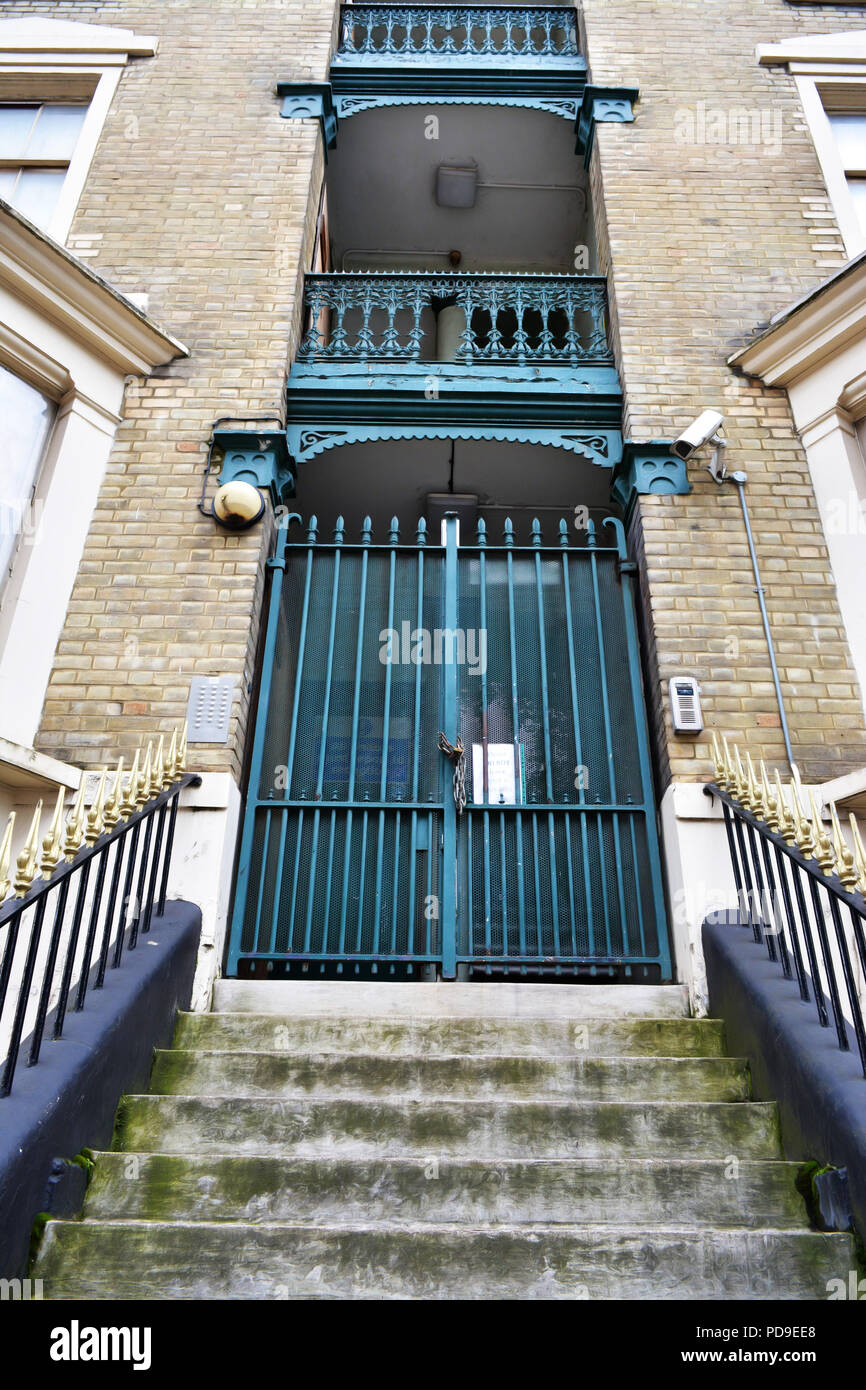 Steps and blue doors, blue entrance and decorations to flat Stock Photo ...